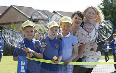 24820912-Caldercuilt Primary School, Glasgow children play tennis in ...