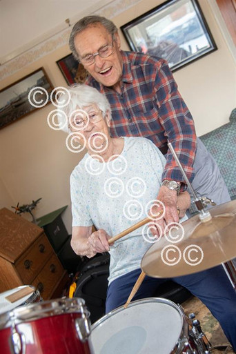 39826492-Brian Singer the 90 year old drummer teaching his wife Tessa ...