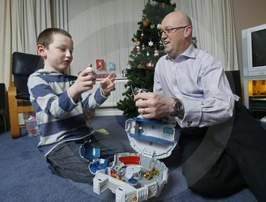 26569137-Nick Bothwell pictured with his six year old son Jack at home ...