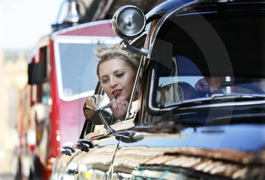 23882261-Hannah Matheson pictured applying her lipstick in a 1958 Ford ...