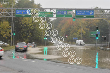 40049975-Chain Bar roundabout is closed due to flooding caused by a ...