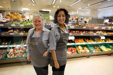 27131499-Waitrose staff celebrate annual bonus. The figure will be ...