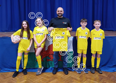 40109596-G Styles Barbers sponsor the Ysgol Bryn Coch football kit ...