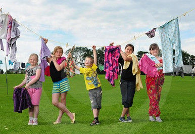 18016871-Charity clothesline: L-r are local children Erin Williamson 7 ...