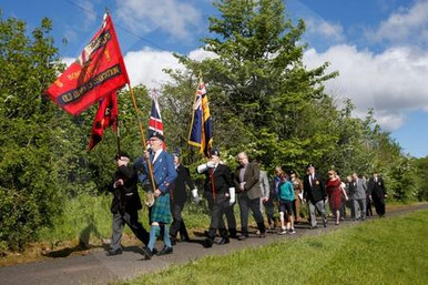 27779208-Fraser Phillips leads the parade to the plaque for James ...