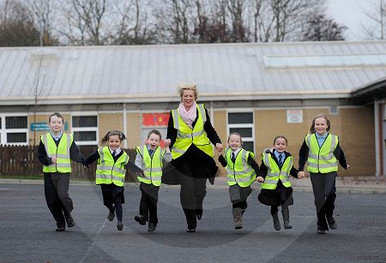 16531292-Warburtons donate high visibility vests to pupils at ...