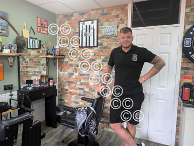 40352562-Matthew Sanson of Barber Shop inside the shop Image: NQ ...