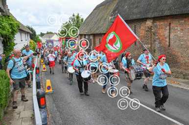 40361168-Unions parade through the village with their banners at the ...