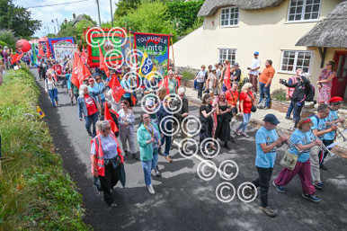 40361128-Unions parade through the village with their banners at the ...