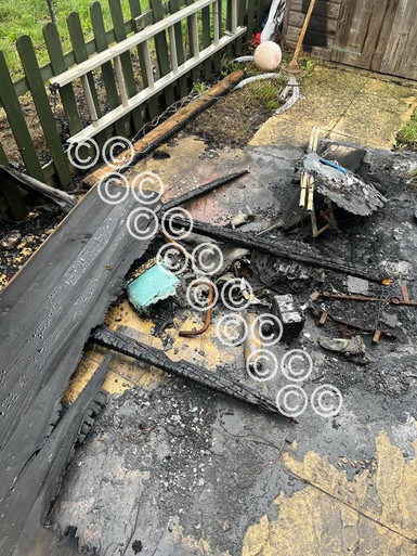 40383174-Debris from the fire is still at the site Image: Henry Durand ...