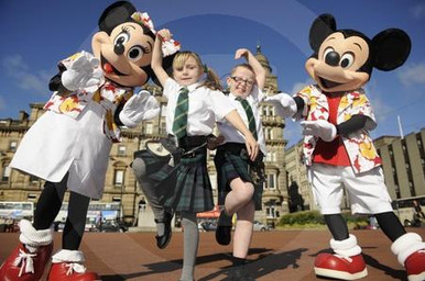 22311585-Photo Jamie Simpson. Mickey Mouse and Minnie Mouse today ...