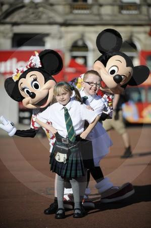 22311586-Photo Jamie Simpson. Mickey Mouse and Minnie Mouse today ...