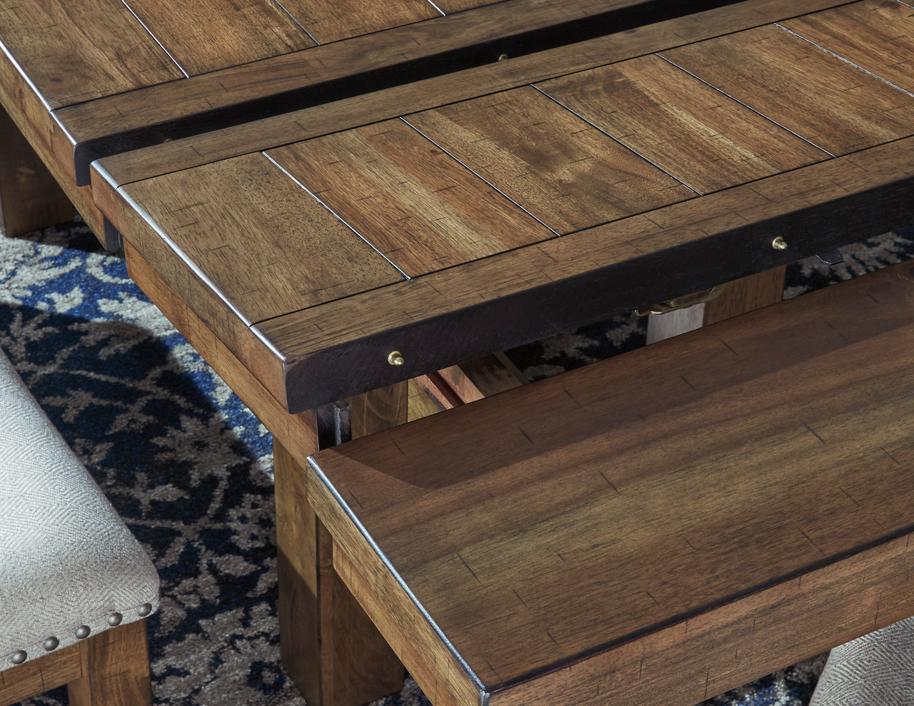 The Moriville Dining Table with two Leaves is available at Cramers Home ...
