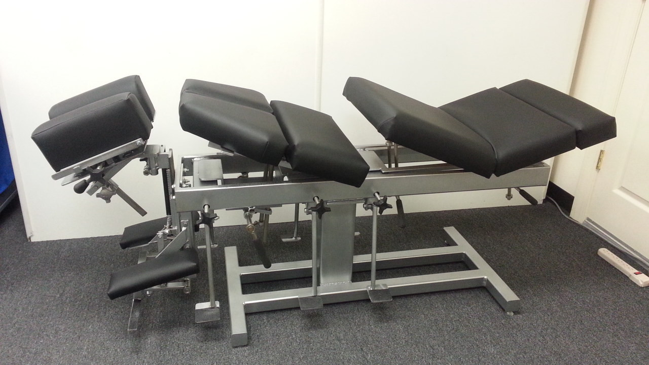 Used Omni Stationary Chiropractic Table