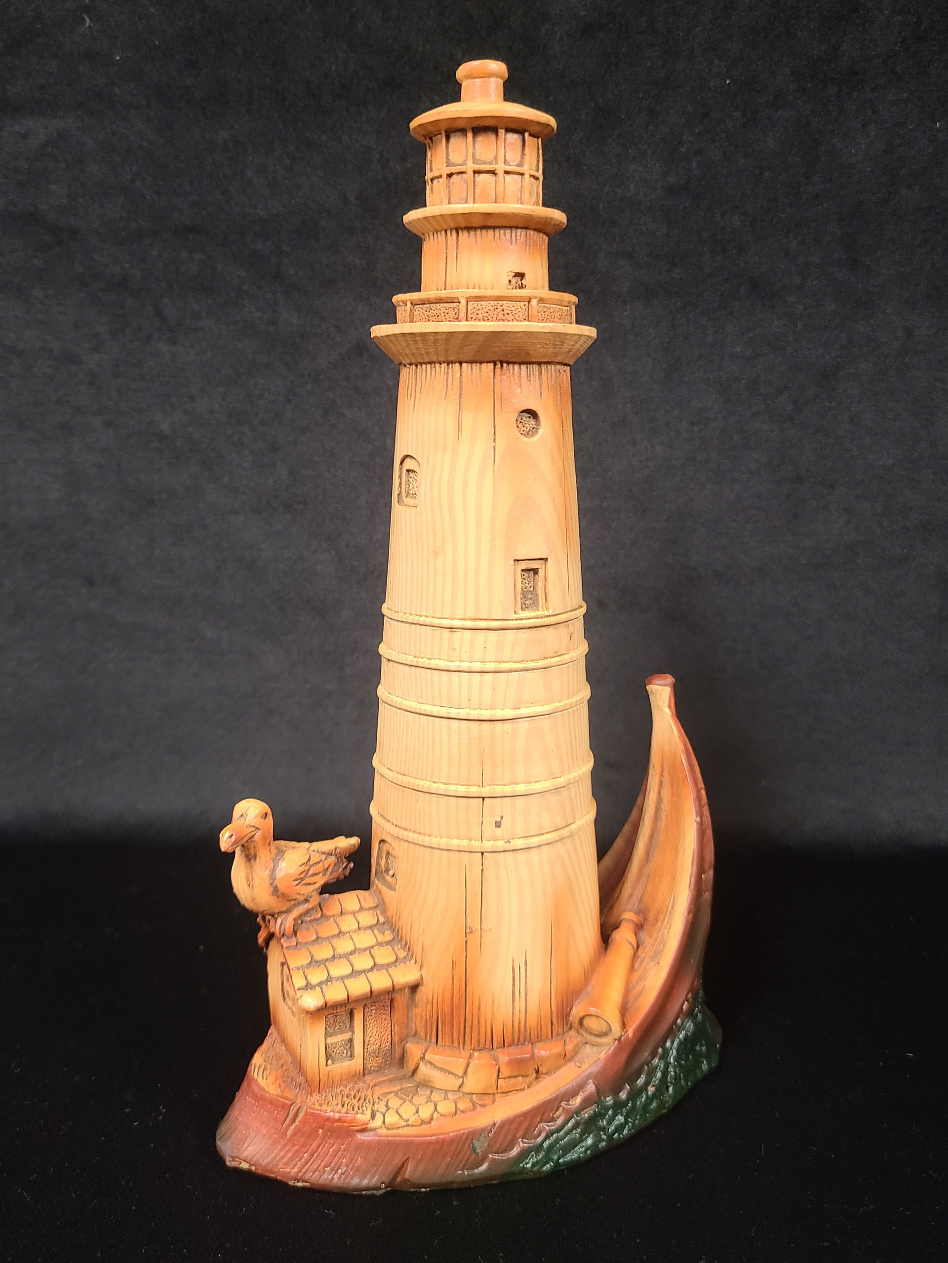 Carved wood lighthouse & preserver statue - Ponce Inlet Lighthouse Locker