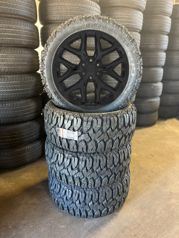 Gloss Black Snowflake 22" Wheels With 33x12.50R22 Mud Terrain Tires