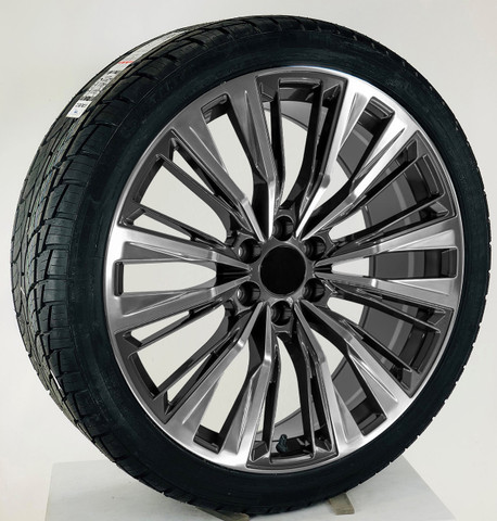 24" Gunmetal and Polished Twelve Quarter Spoke Wheels With 295-35R24 Tires