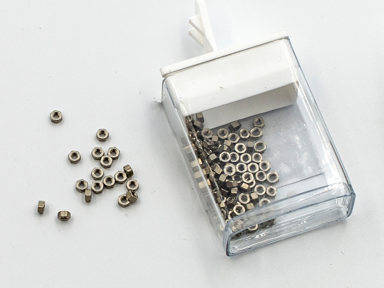 M1 4 Hex Nut Nickel Silver 100 Count 11421 Minitaps M1 4 Hex Nut Nickel Silver 100 Count 11421 Minitaps