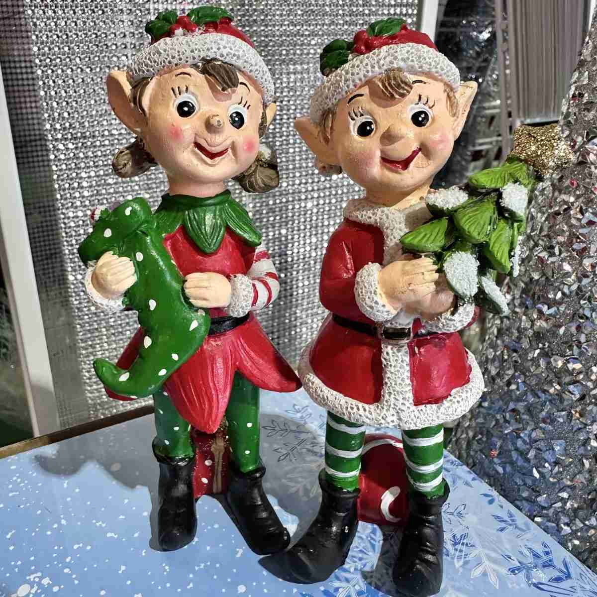 Red Green Christmas Elf holding a Christmas Tree and a Christmas ...