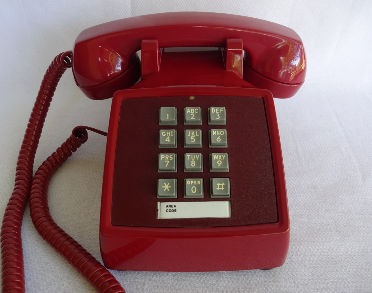 Red 2500 telephone is made by Western Electric and has a volume control ...