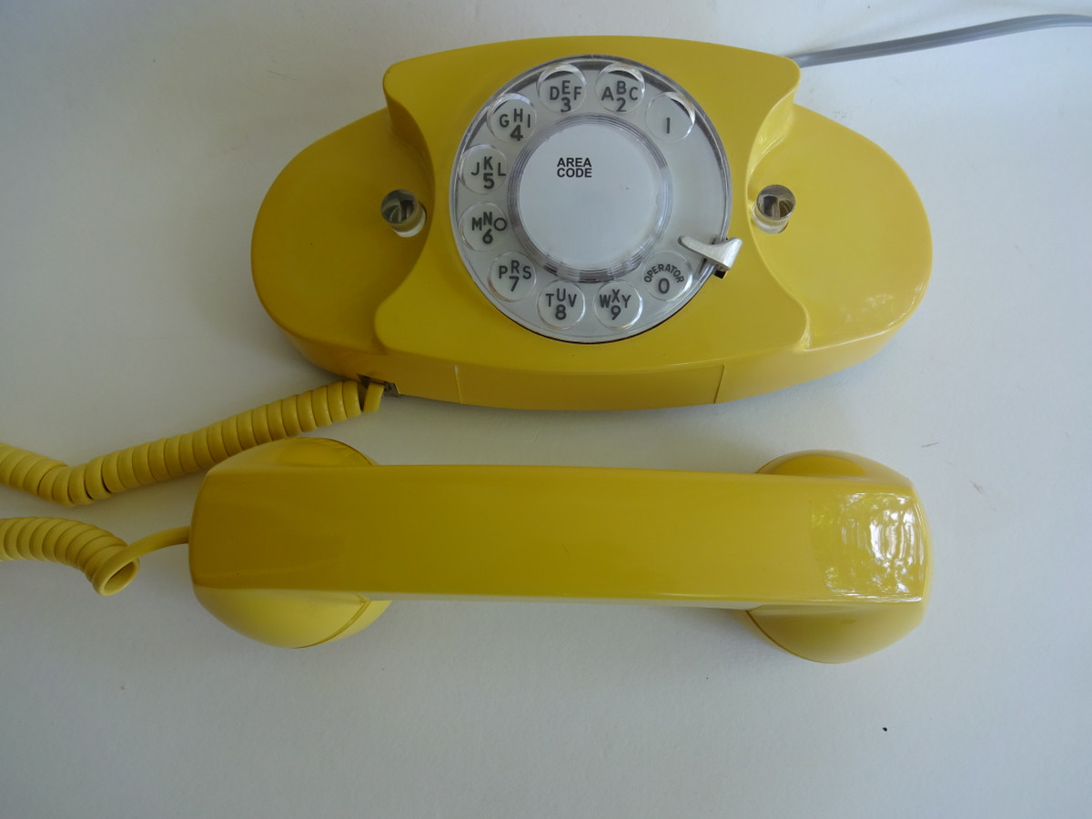 Yellow princess rotary phone made by Western Electric | Old Phone Shop