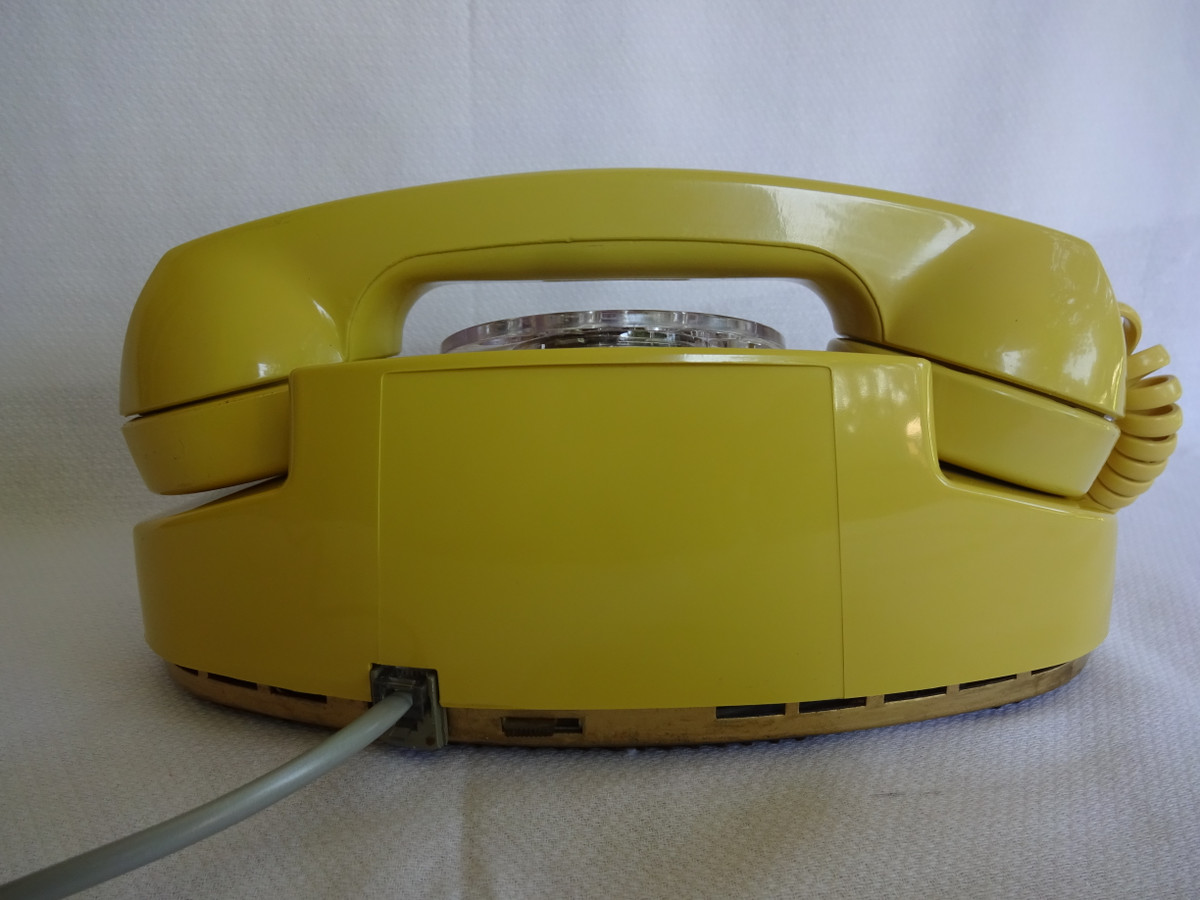 Yellow princess rotary phone made by Western Electric | Old Phone Shop