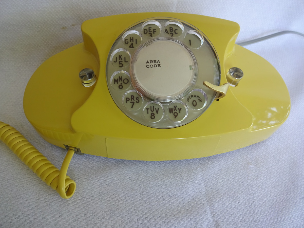 Yellow princess rotary phone made by Western Electric | Old Phone Shop