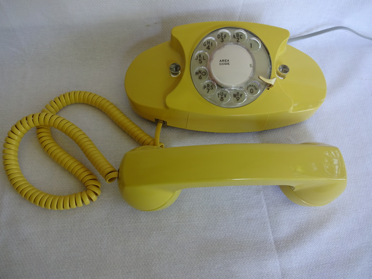 Yellow princess rotary phone made by Western Electric | Old Phone Shop