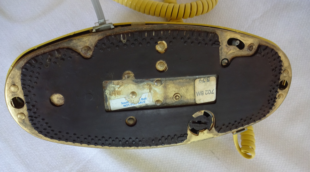 Yellow princess rotary phone made by Western Electric | Old Phone Shop