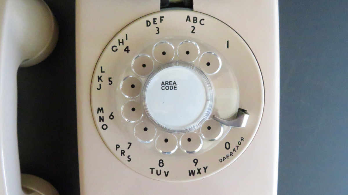 Western Electric Rose Beige 554 rotary dial wall telephone Old Phone Shop