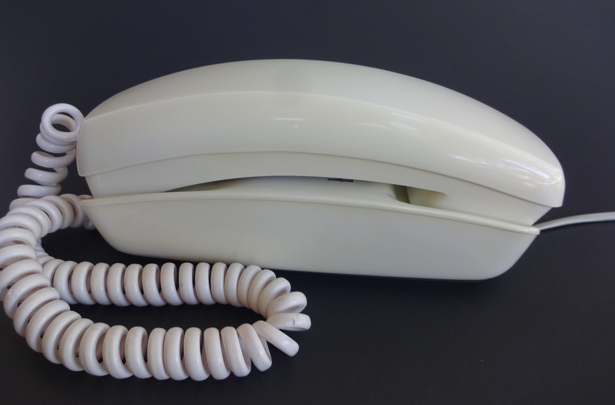 Western Electric Yellow trimline wall telephone | Old Phone Shop
