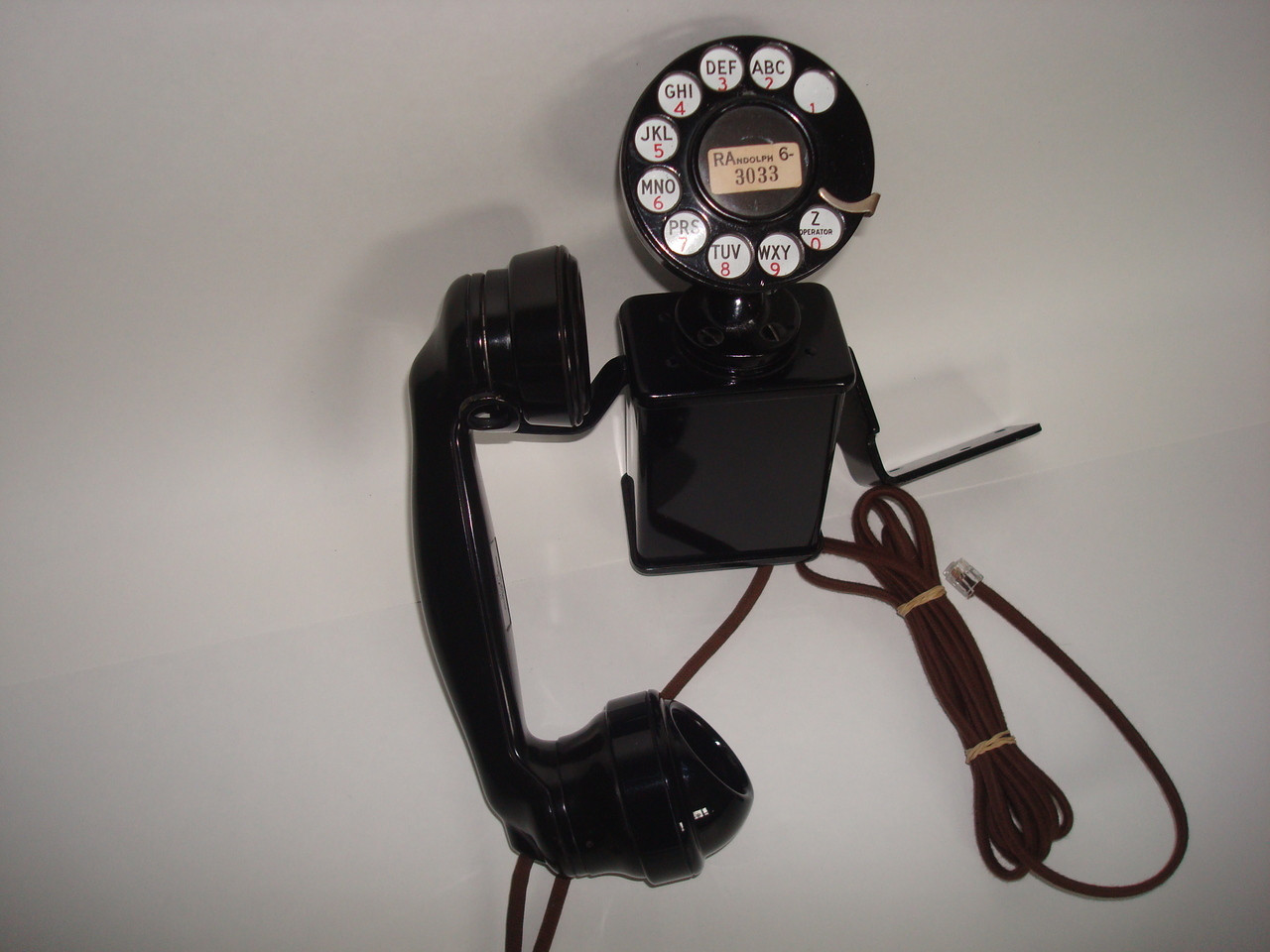 Digital or pulse to rotary dial convertor for antique telephones