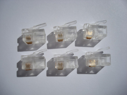 Modular line cord plug RJ11 for telephone wall cords or line cords ...