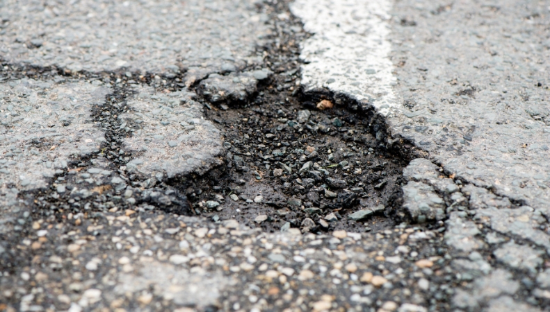 5 REASONS WHY POTHOLES FORM - Red Stag Materials