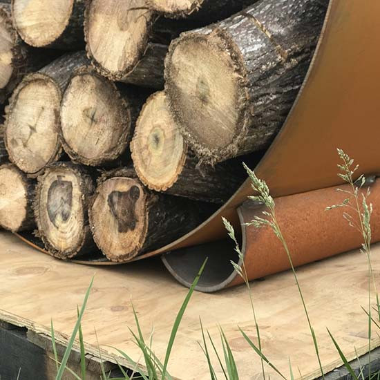 Round Steel Fire Wood Log Rack - 38 Inch Diameter Natural Rust Finish