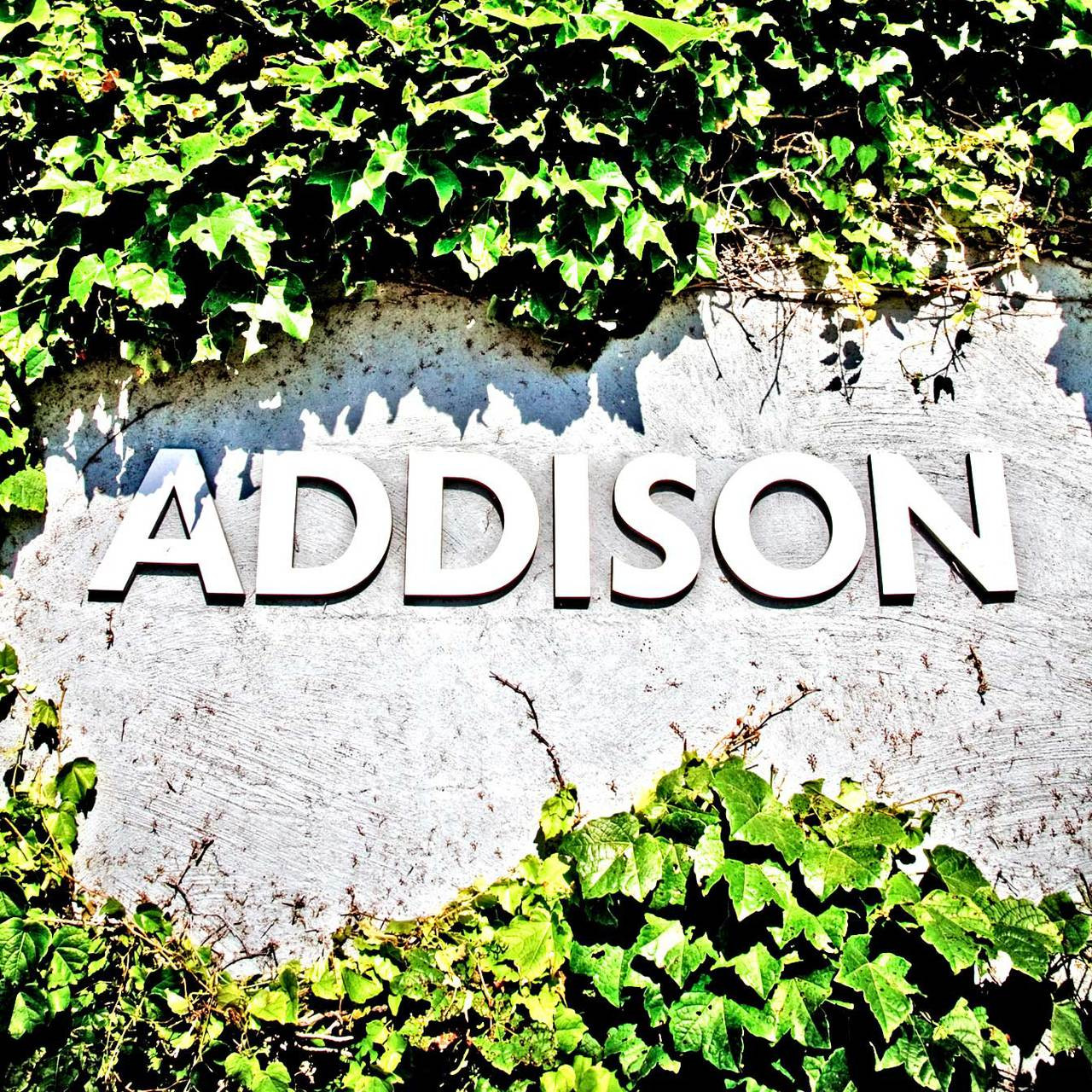Ivy-Filled Addison Sign