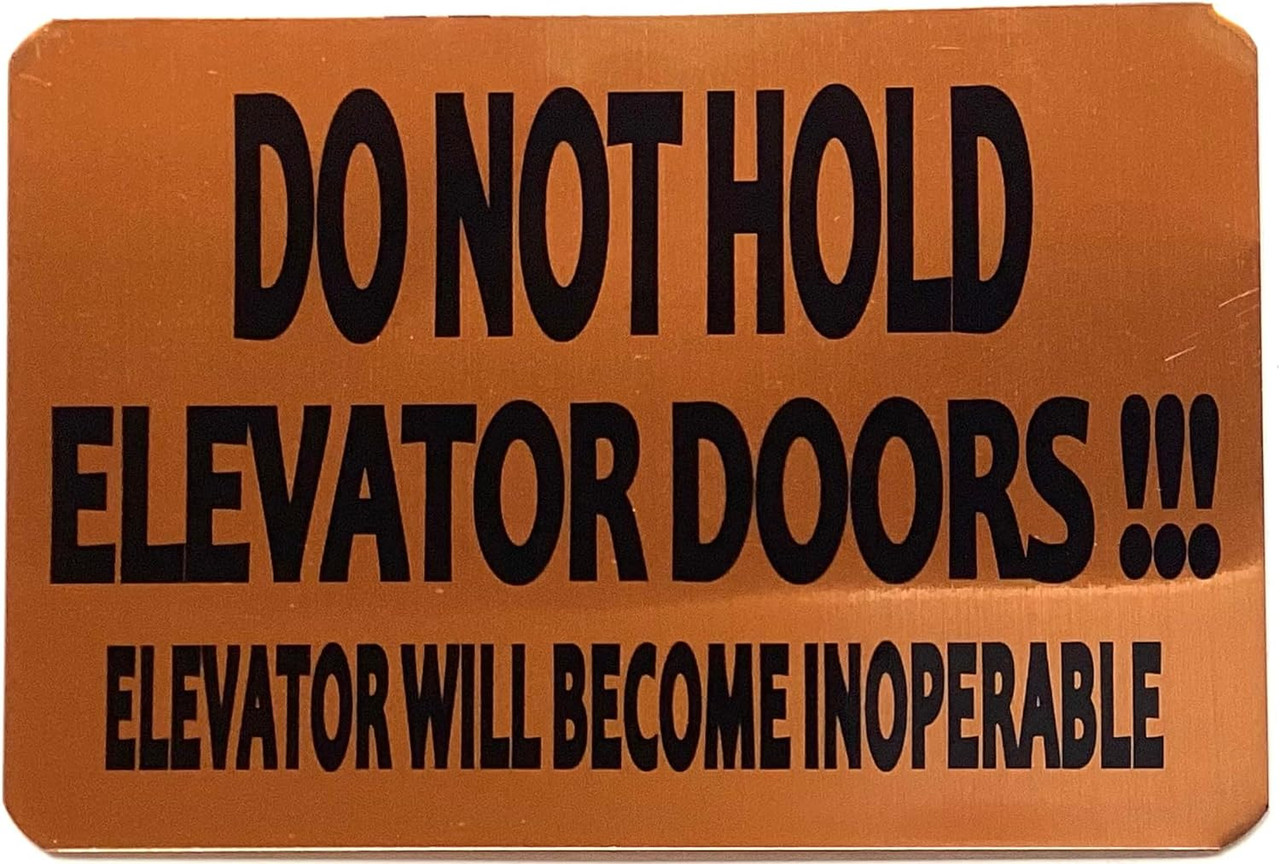 DO NOT HOLD ELEVATOR DOORS ELEVATOR WILL BECOME INOPERABLE SIGN