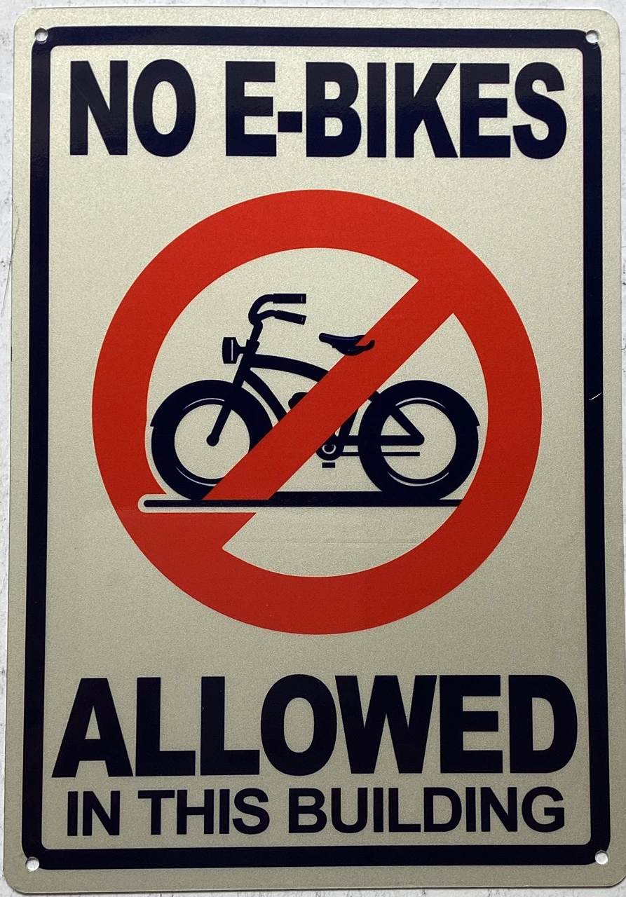 No E-Bikes Allowed in this building sign