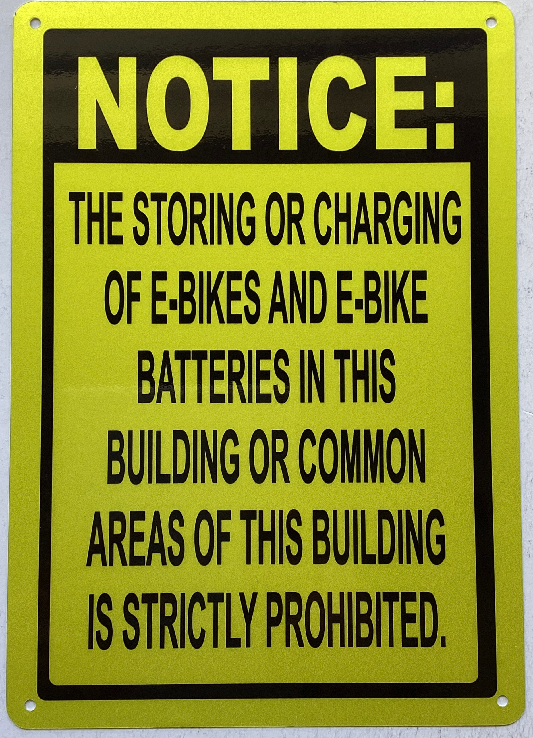 NO E- BIKE SIGN IN BUILDING
