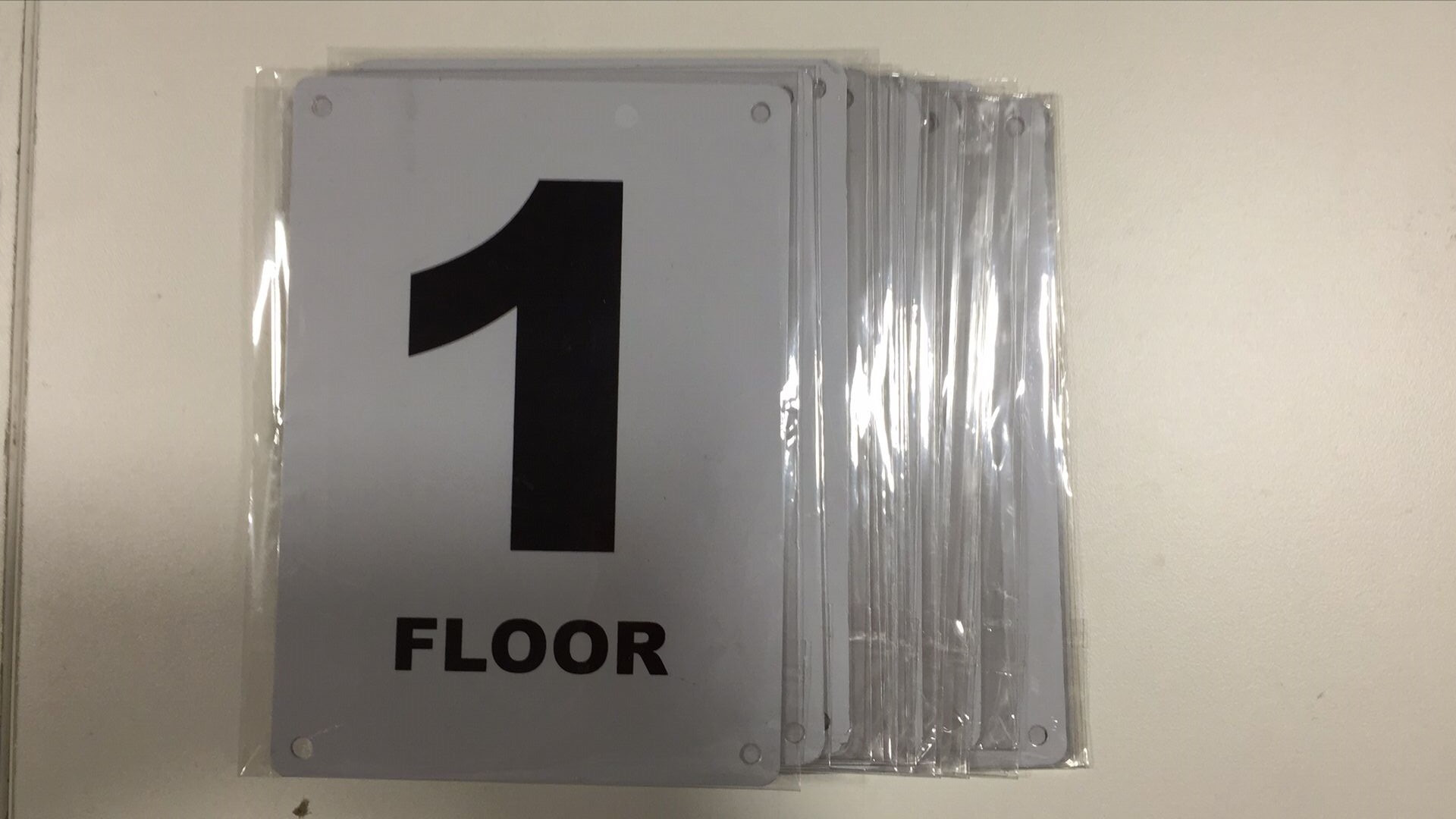 FLOOR NUMBER ONE SIGN
