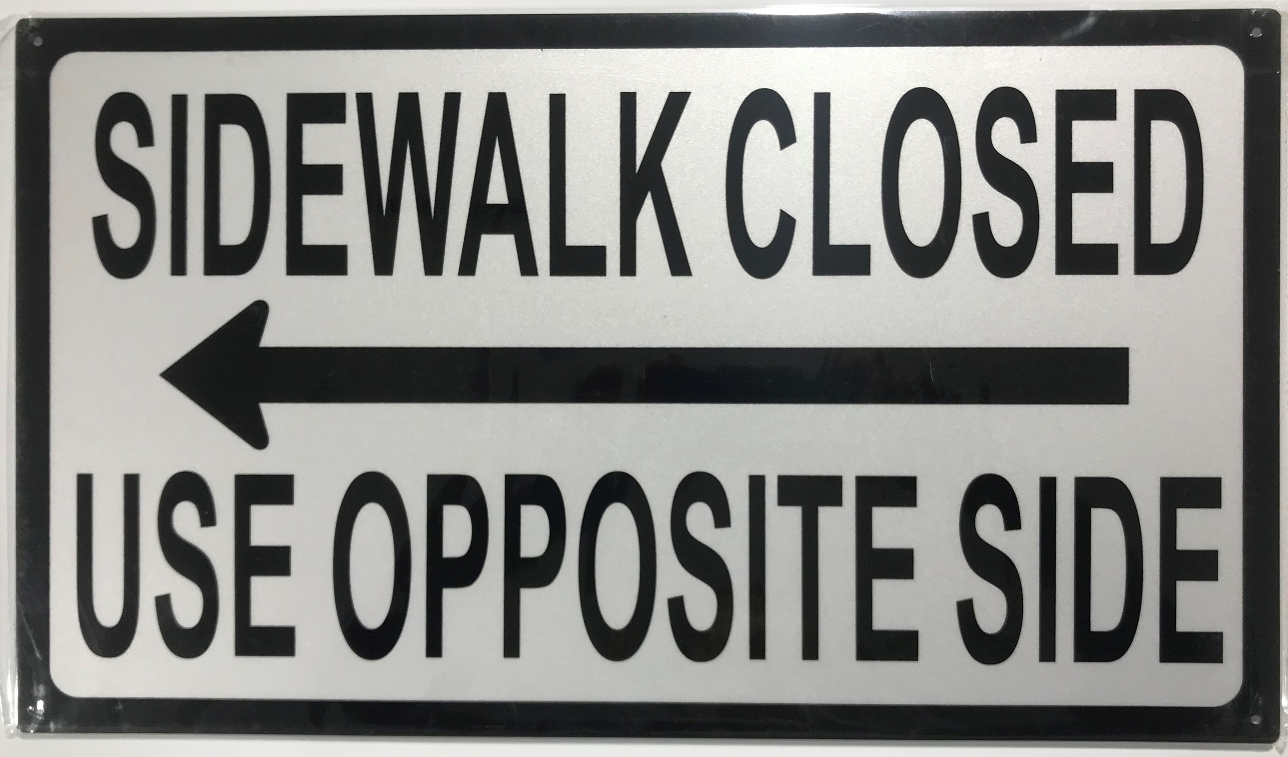 Sidewalk Closed sign USE OPPOSITE SIDE SIGN left ARROW