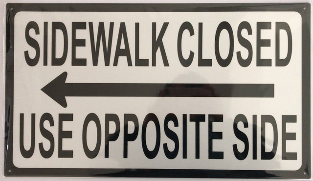 Sidewalk Closed sign USE OPPOSITE SIDE SIGN left ARROW