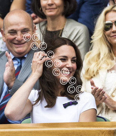 35121073-THE DUCHESS OF CAMBRIDGE ARRIVES ON THE CENTRE COURT AT ...