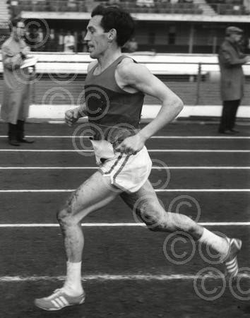 32497357-Olympic Athlete Jim Alder James Alder wins the six mile race ...