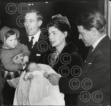 32599029-Athlete Sir Roger Bannister Holding 2yo Erin with his wife ...