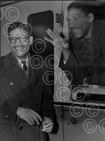 34373205-Dr Arthur Wint, Jamaican runner, on train at Paddington ...