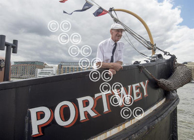35236717-Captain Tom Carlaw onboard The last steam Tug as it receives a ...