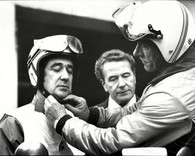 39120509-Lord William Rodgers having helmet fitted as he learns to ride ...
