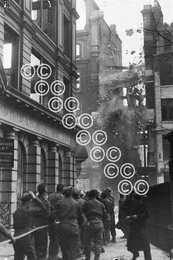 35546816-The Royal Engineers making a bomb damaged building safe ...