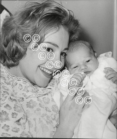 34866566-Actress and singer Stephanie Voss with her 3 day old baby son ...